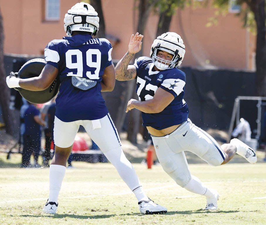 Defensive tackle Trysten Hill (right), moving around defensive end ...
