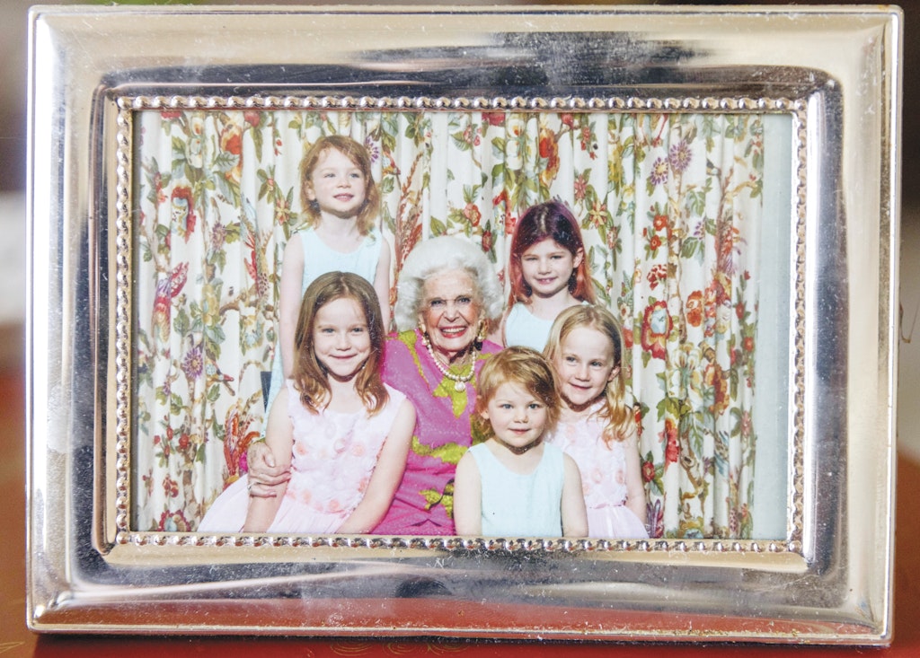 a photo of wolfram with her great grandchildren is on display in her ...