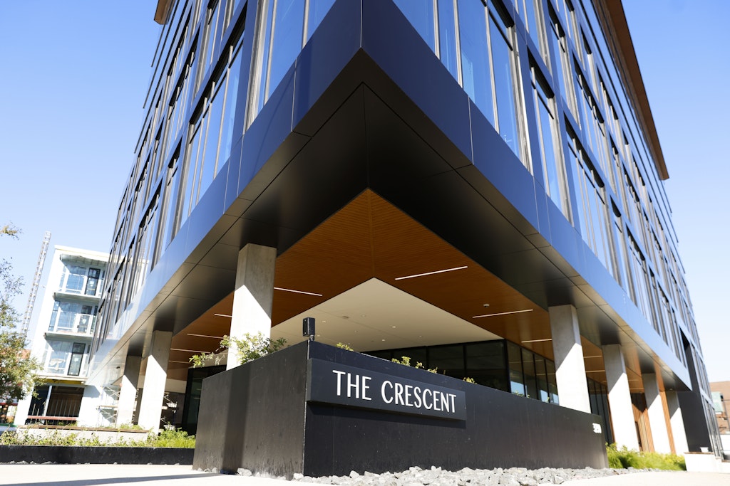 the crescent office building designed by oz architecture includes a ...